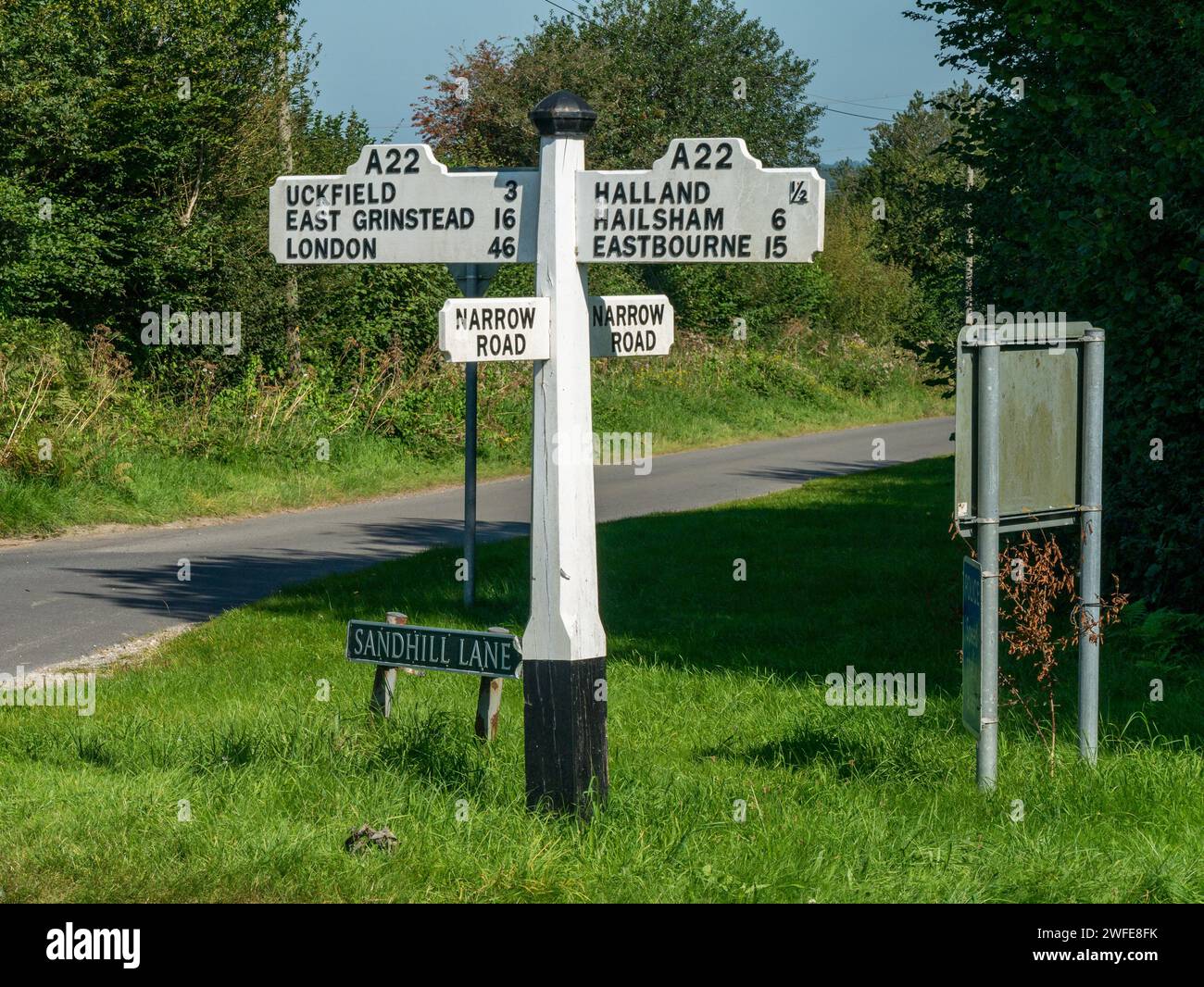 Attractive old, traditional, vintage wooden fingerpost road sign with ...