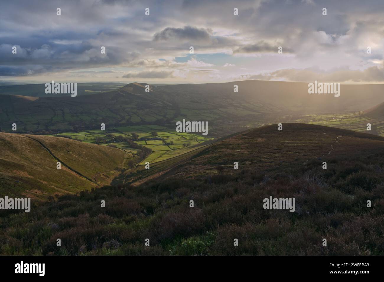 Setting Sun over Mam Tor and the Vale of Edale from Kinder Scout, Peak ...