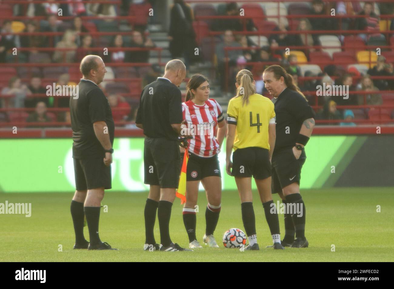 Referee Lucy Clark talks to captains at coin toss Brentford Women v ...