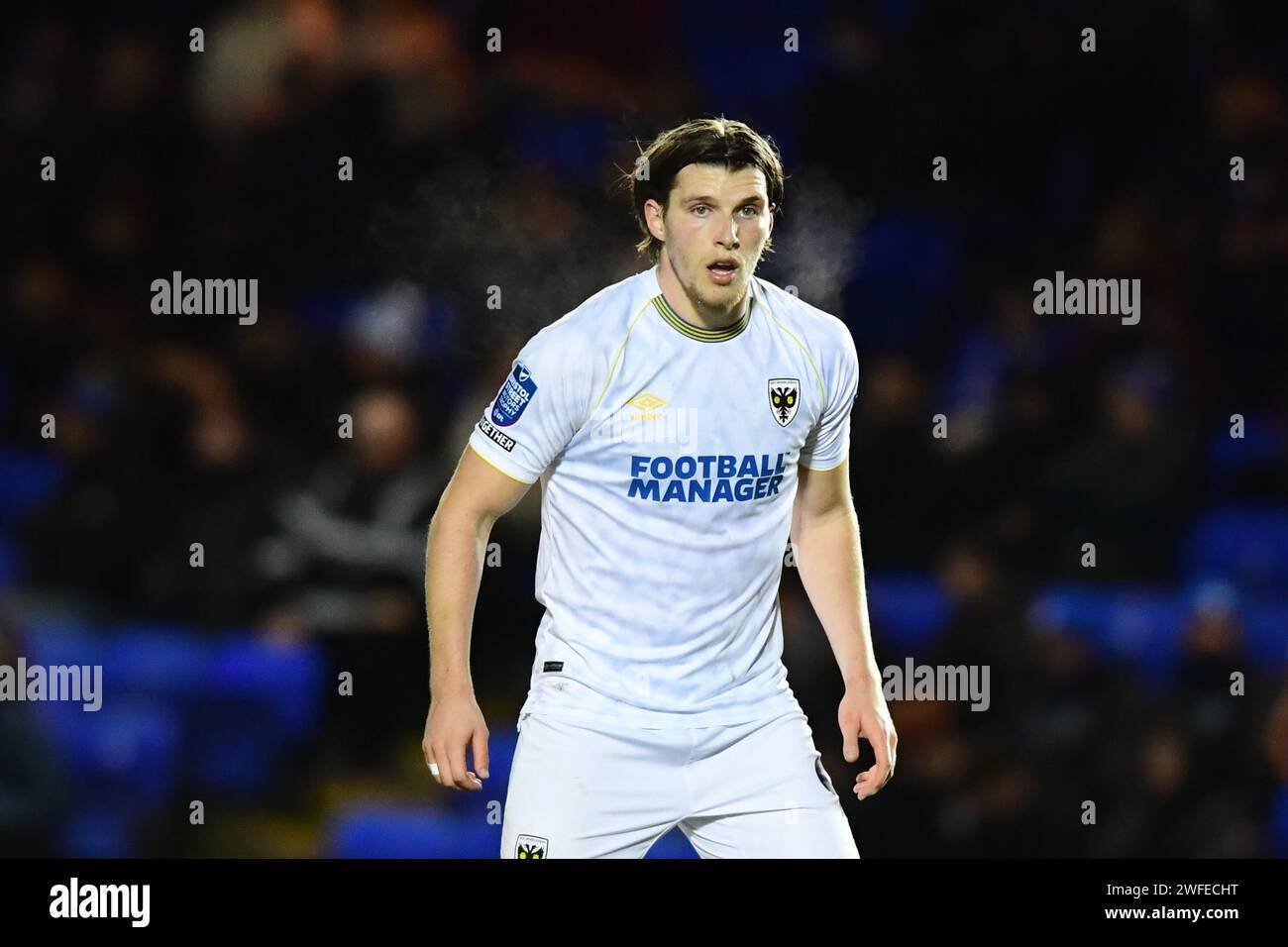 Josh Davidson (9 AFC WImbledon) looks on during the EFL Trophy Quarter ...
