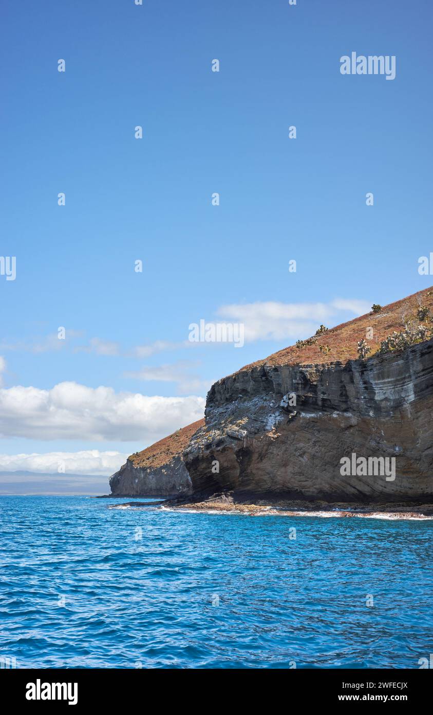 Cliff of an uninhabited island seen from the water, Galapagos National ...