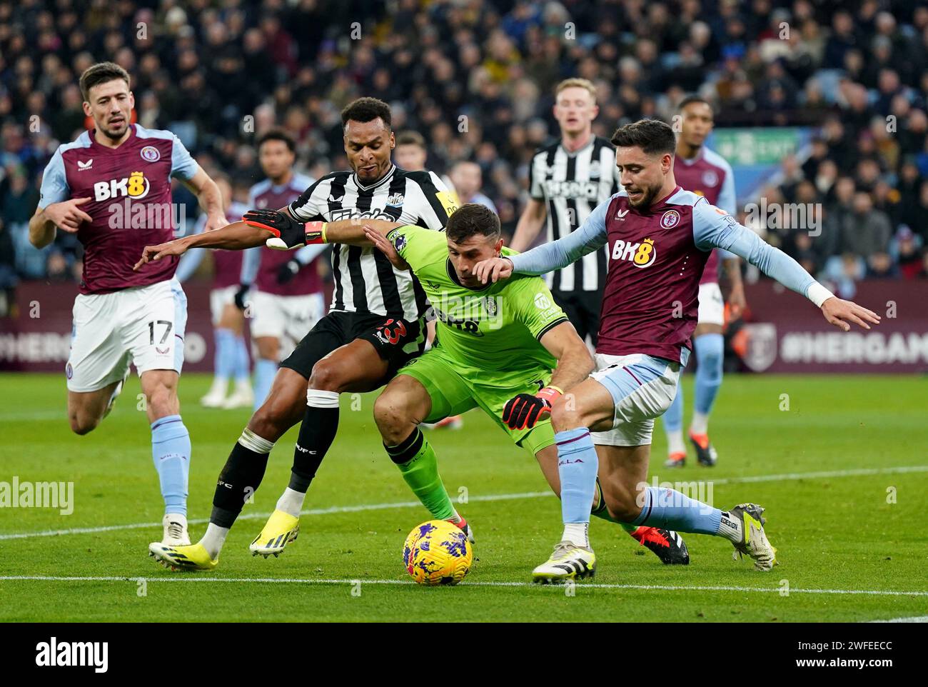 Newcastle United's Jacob Murphy (second left) battles for the ball with ...