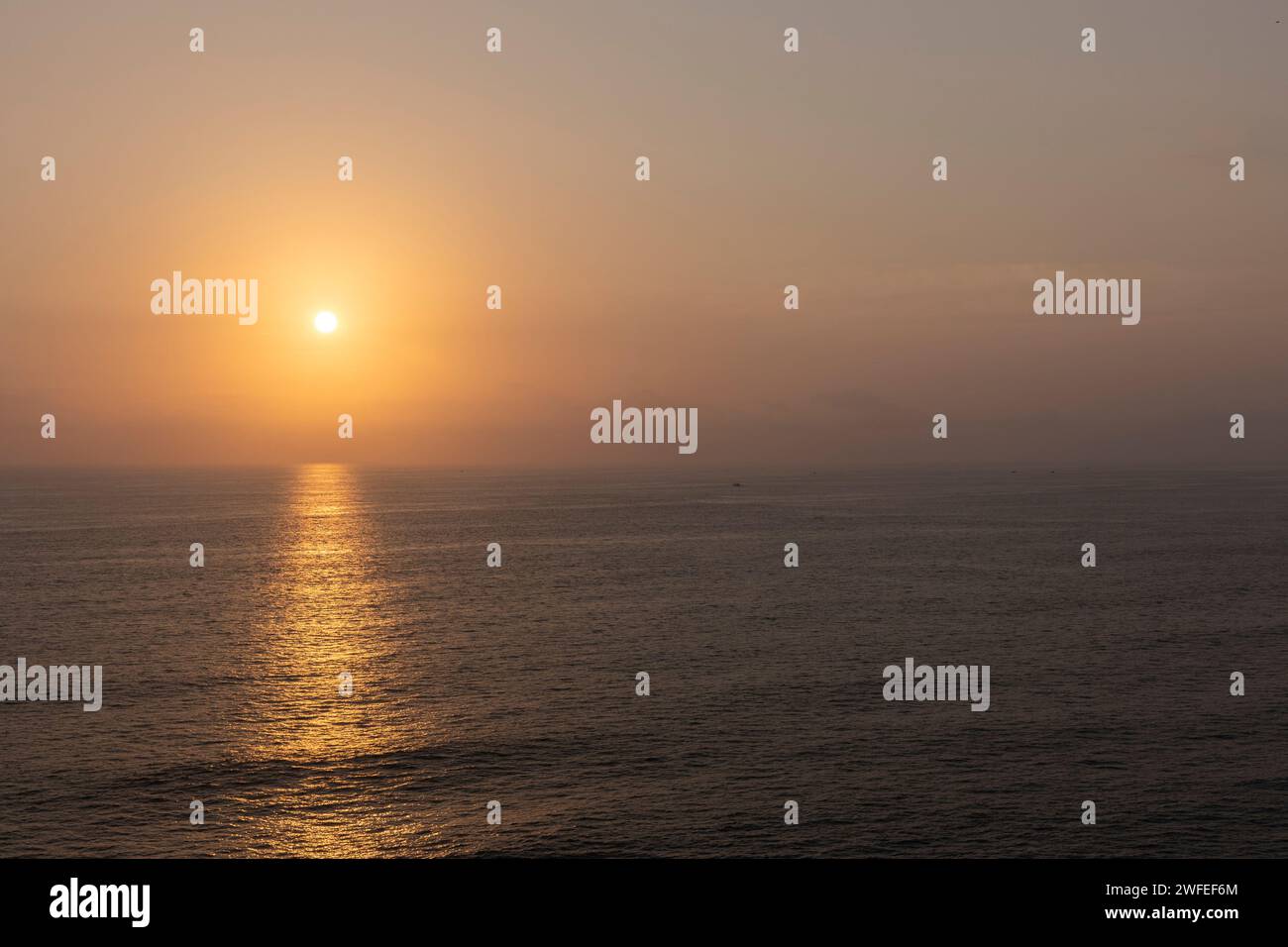 Sunset over the Indian Ocean. Sunset in Bali, Indonesia Stock Photo - Alamy