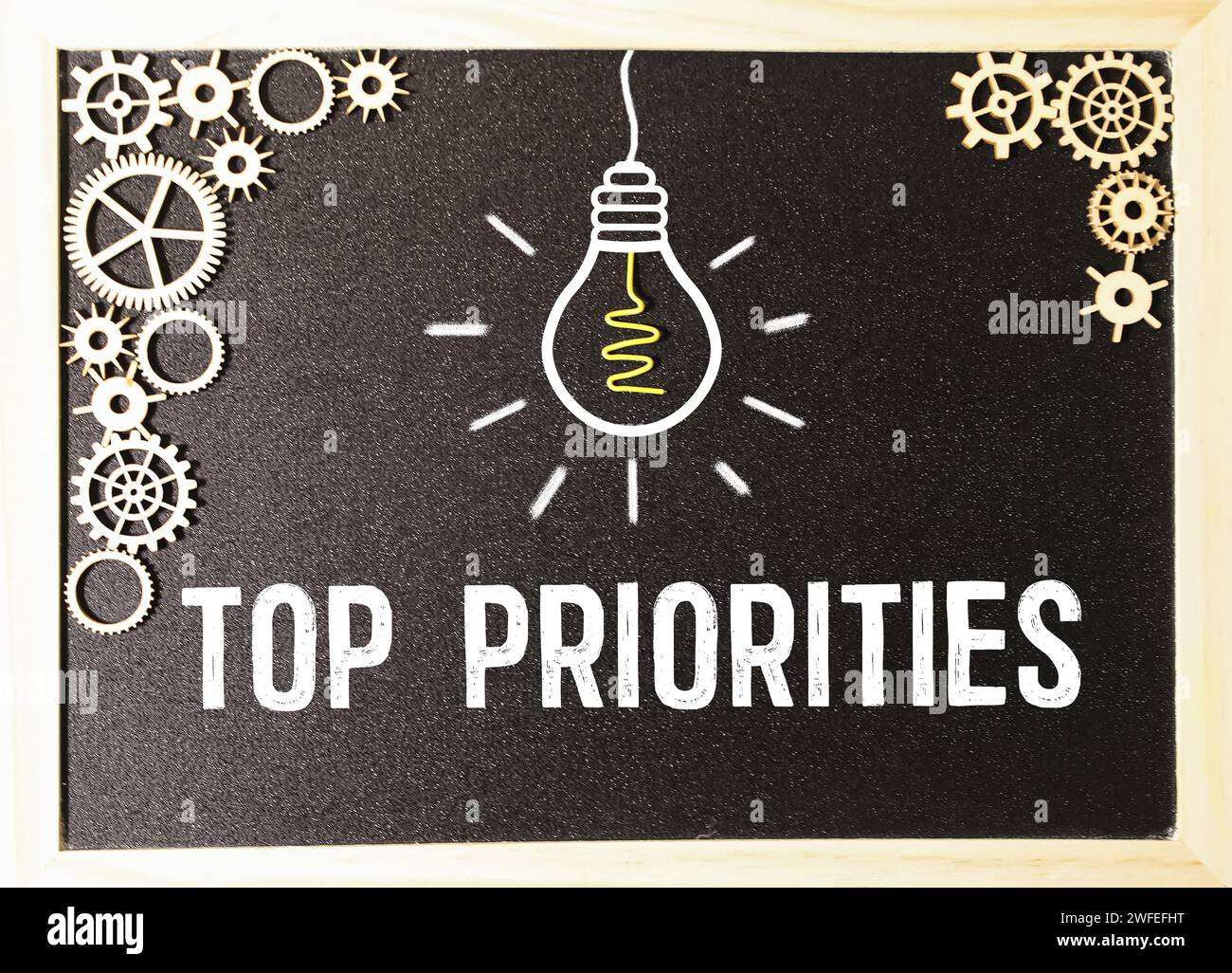 Top Priority text circled in pencil on textured paper Stock Photo - Alamy