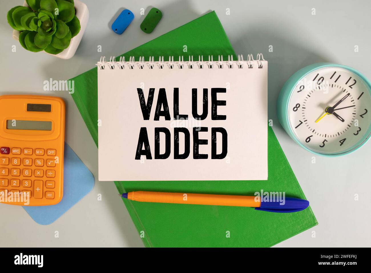 Wooden blocks with words 'Value added' Stock Photo - Alamy