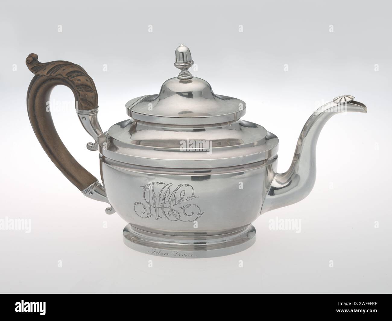 Teapot made by Peter Bentzon. The silver teapot has an oval vase-shape ...