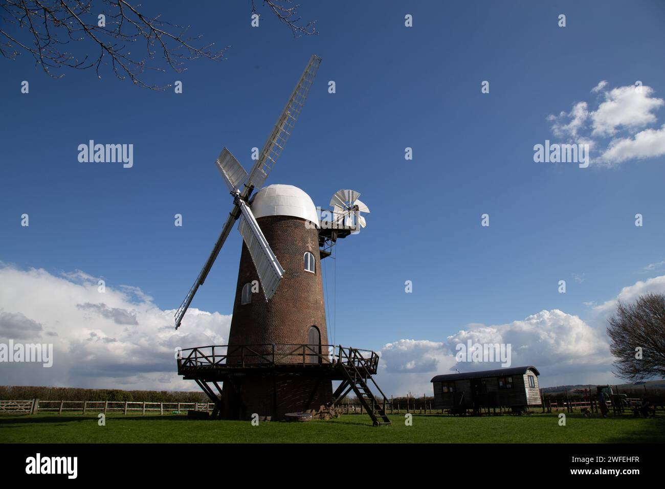 The historic Wilton Windmill under a bright blue sky Stock Photo - Alamy