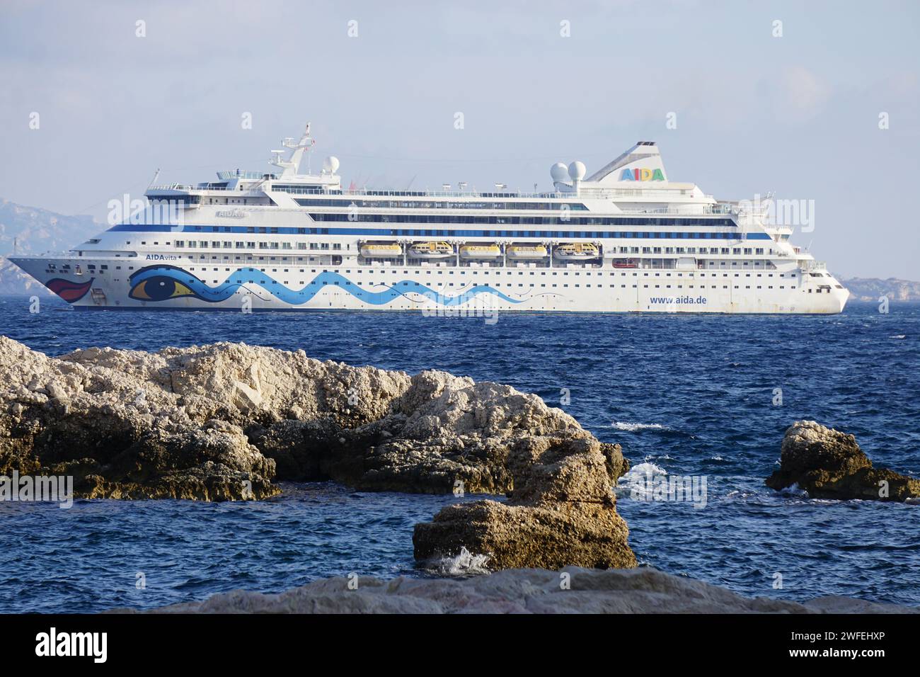 huge ocean liner with funky painting on hull on the mediterranean sea ...