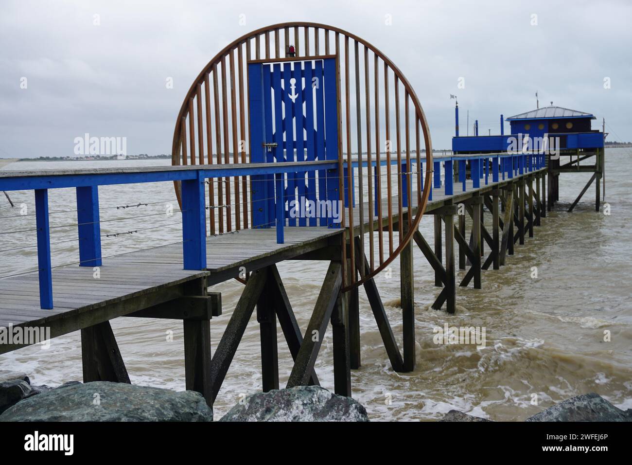 unusual gate entrance to a wooden pier in Vendée, west coast of france ...