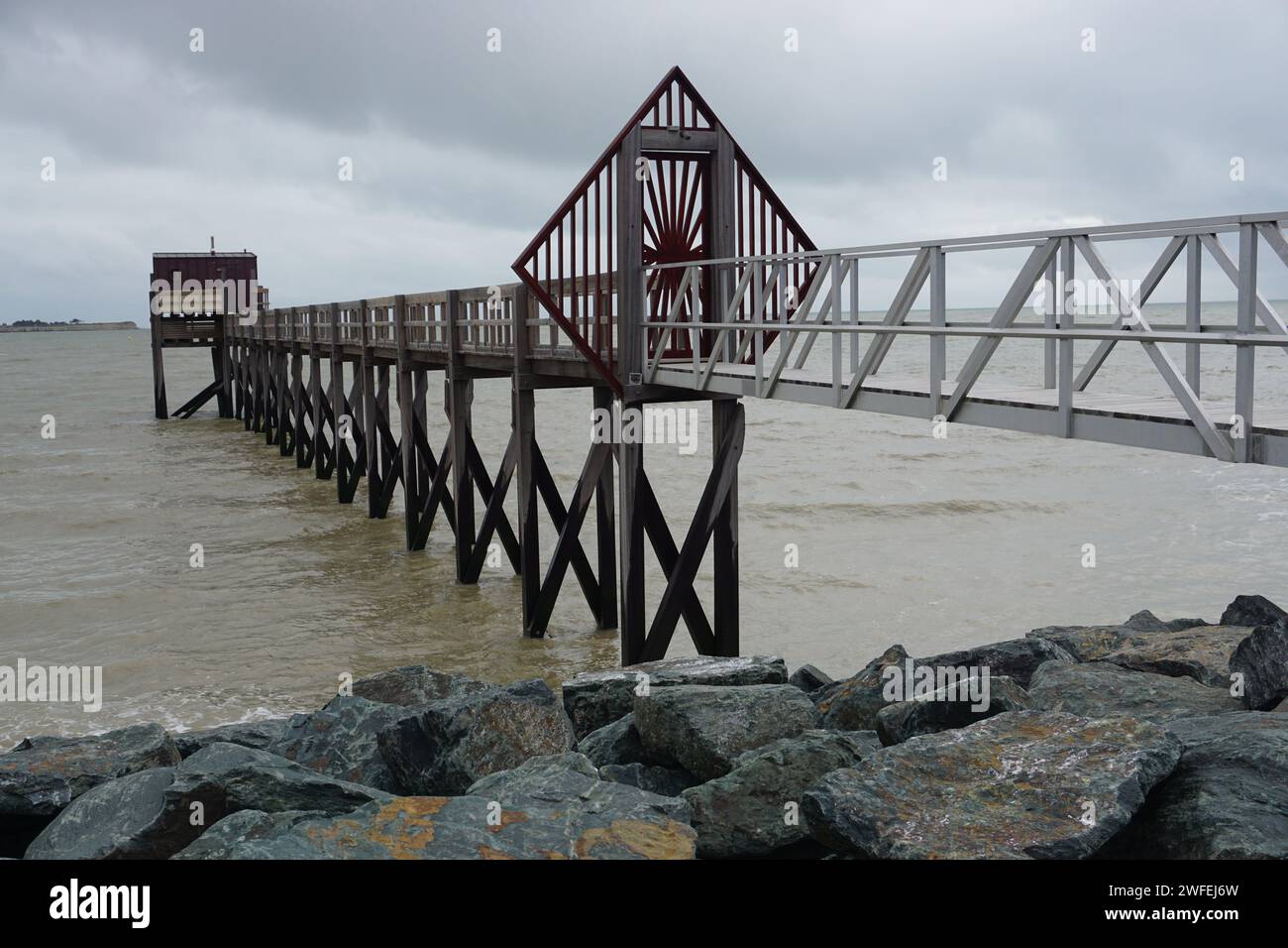 unusual gate entrance to a wooden pier in Vendée, west coast of france ...