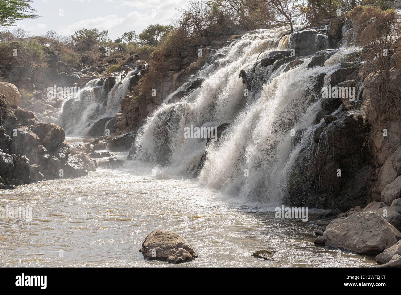 A waterfall into a rocky gorge in the Awash National Park, Ethiopia ...