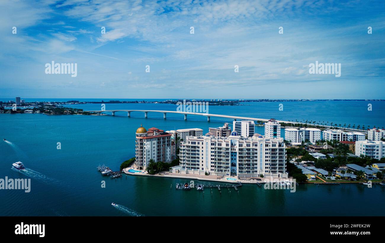 An aerial view of the Downtown Sarasota with the Ringling Bridge behind ...