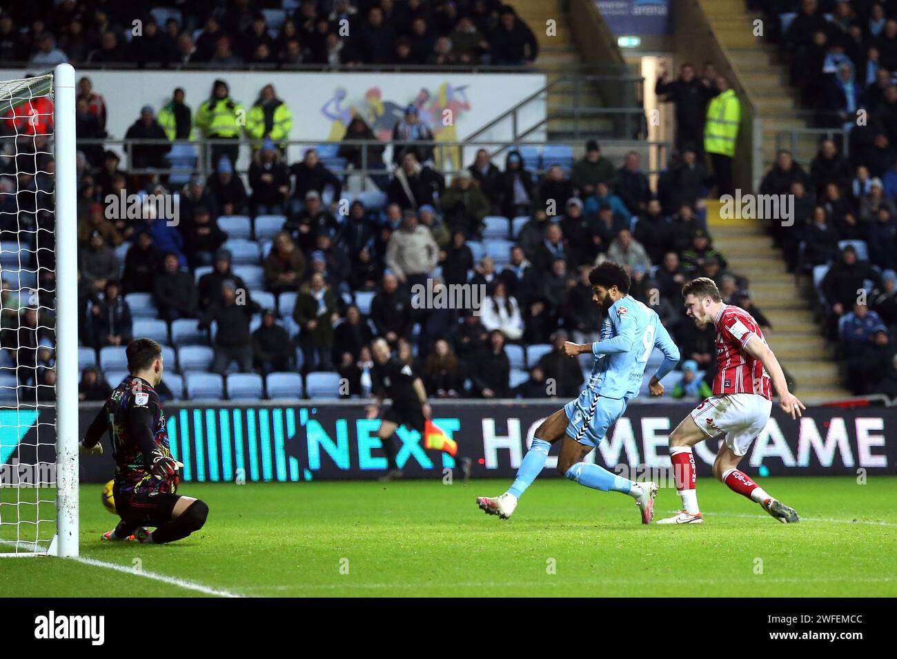 Coventry City's Ellis Simms scores their side's second goal of the game ...