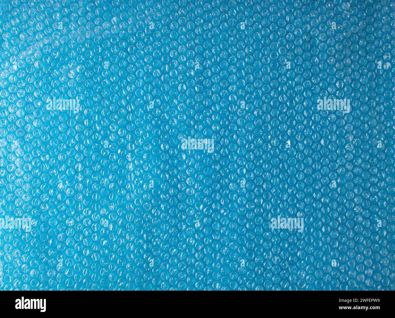 Blue background with bubble transparent foil texture. Trendy creative ...