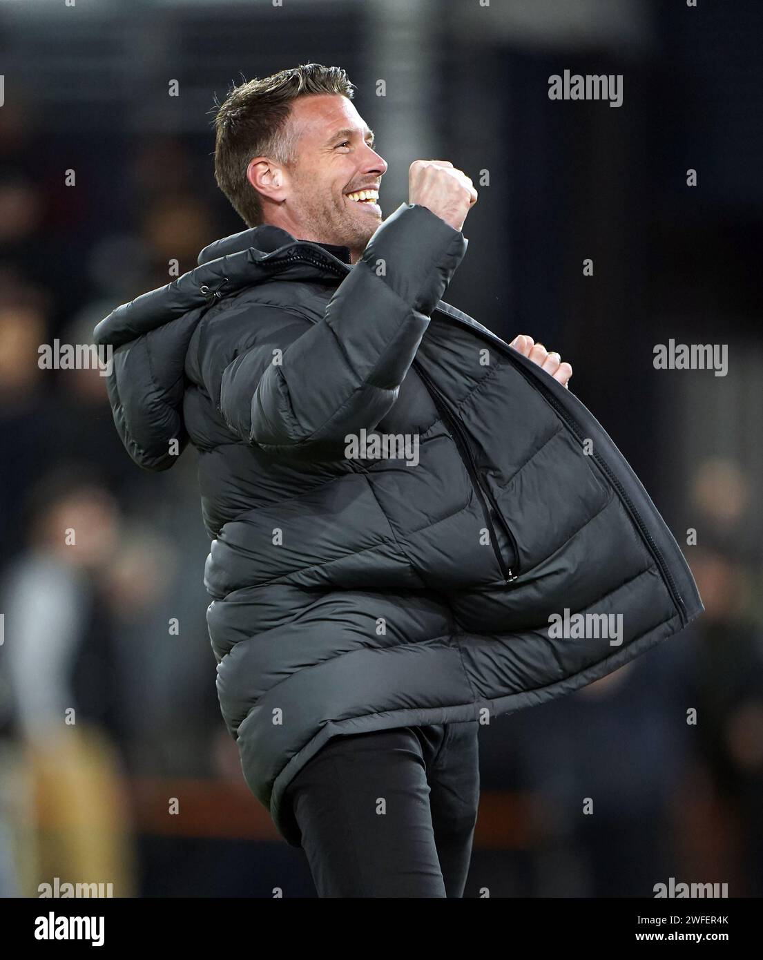 Luton Town manager Rob Edwards applauds the fans after the Premier ...