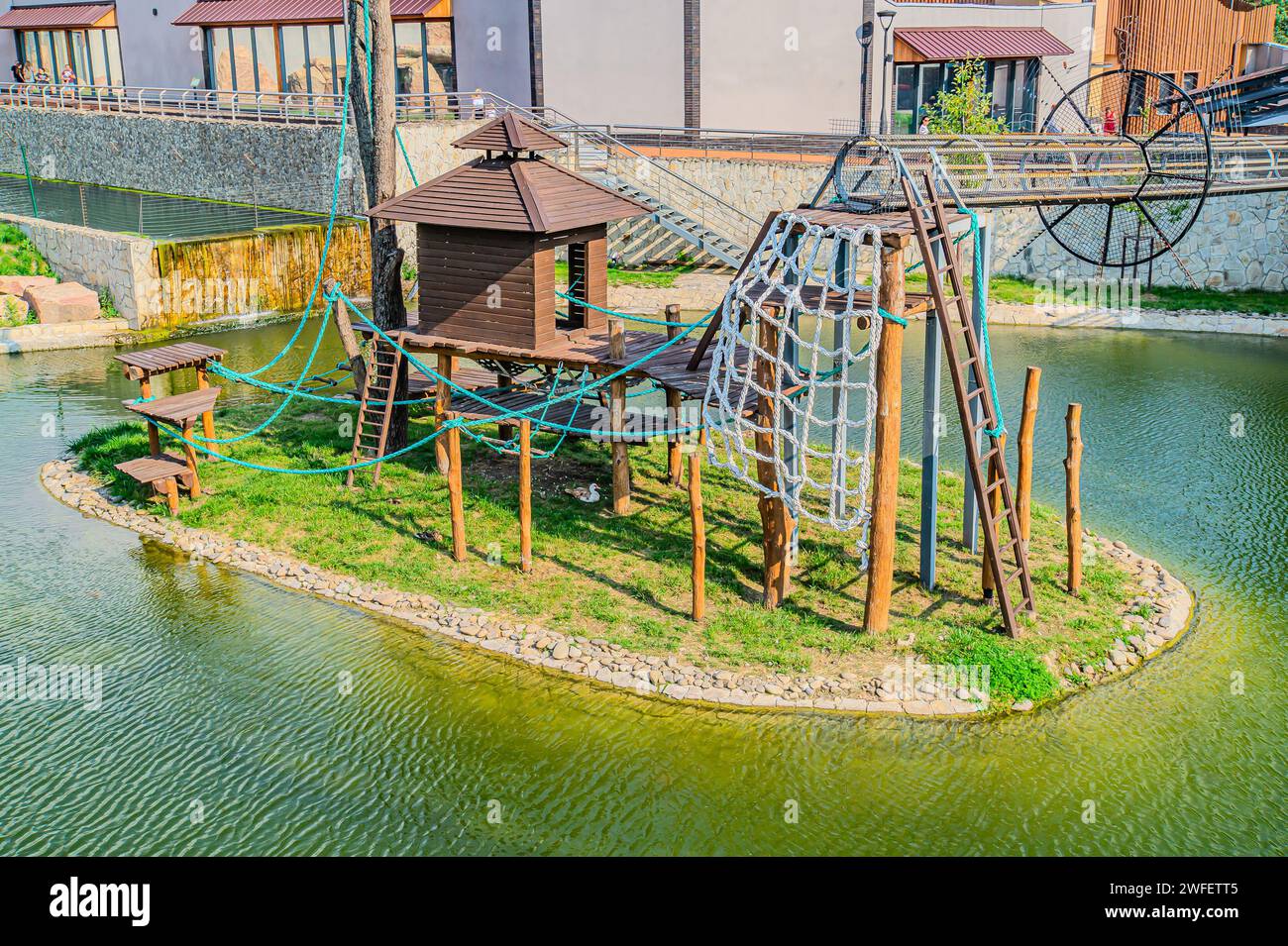 Colorful children's play activities in a public park surrounded by ...