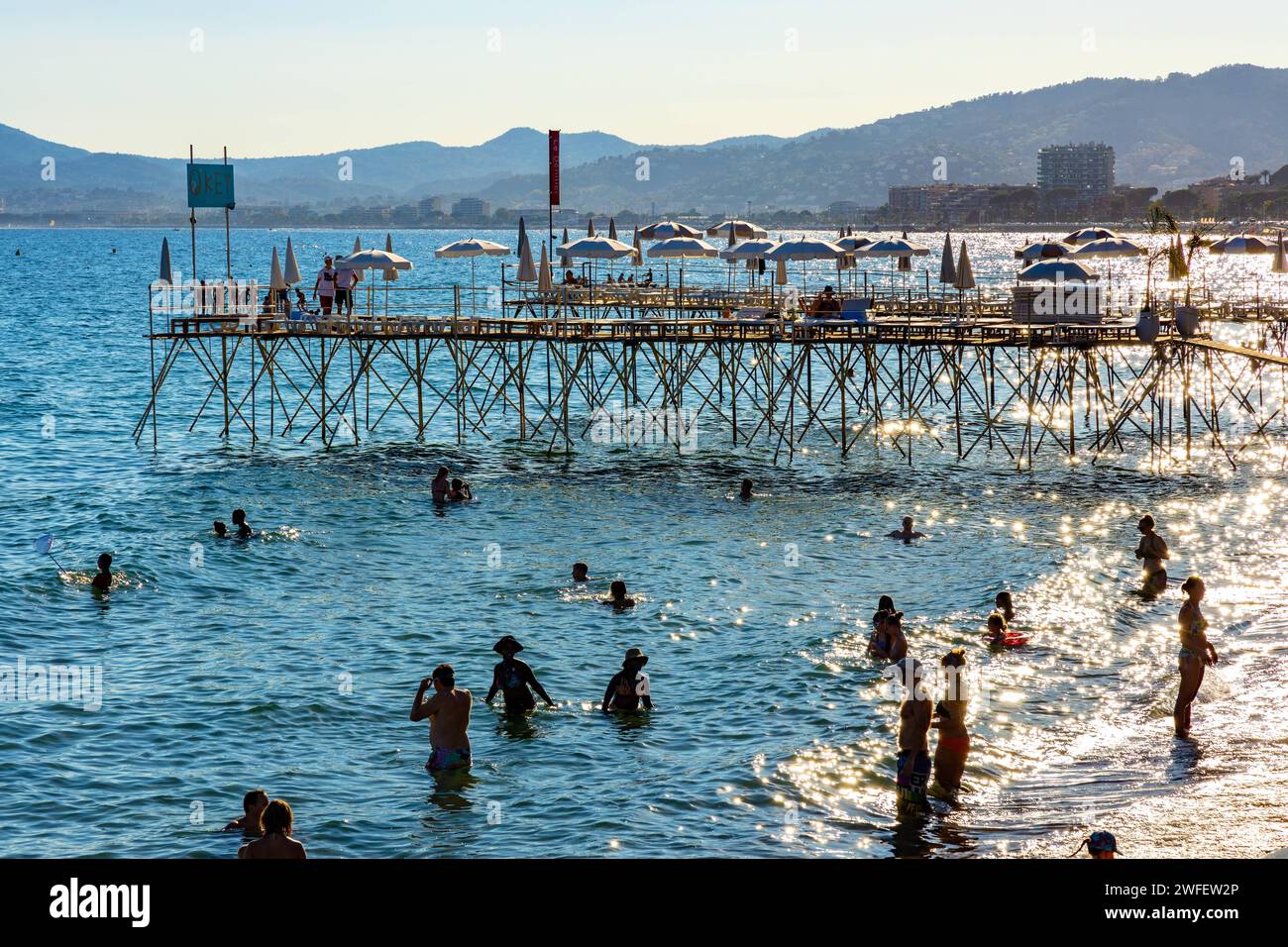 Cannes, France - July 31, 2022: Tourists sunbathing on Plage du Midi ...