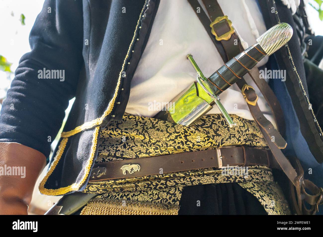 Medieval soldier with a dagger in his belt Stock Photo - Alamy