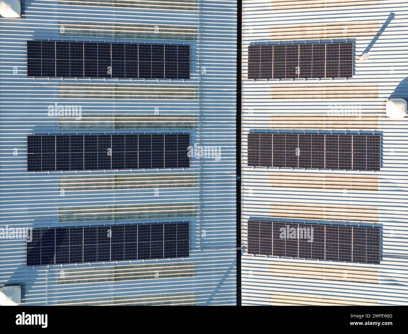 Aerial top down view of solar panel photovoltaic cells on roof of ...