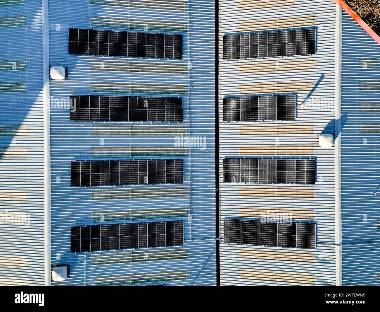 Aerial top down view of solar panel photovoltaic cells on roof of ...