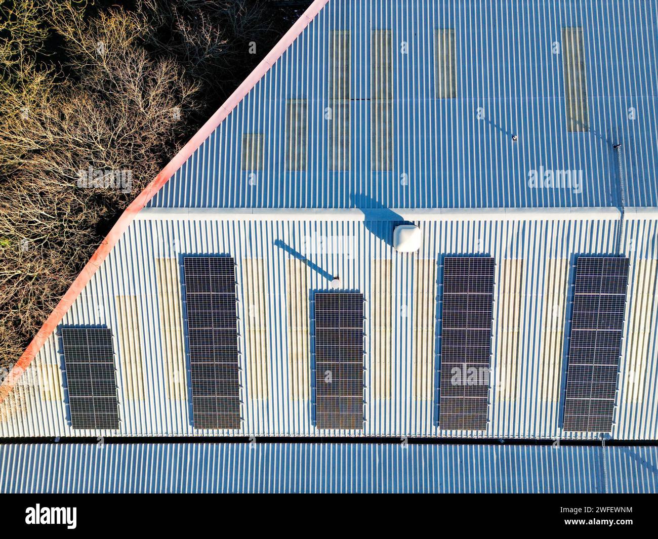Aerial top down view of solar panel photovoltaic cells on roof of ...