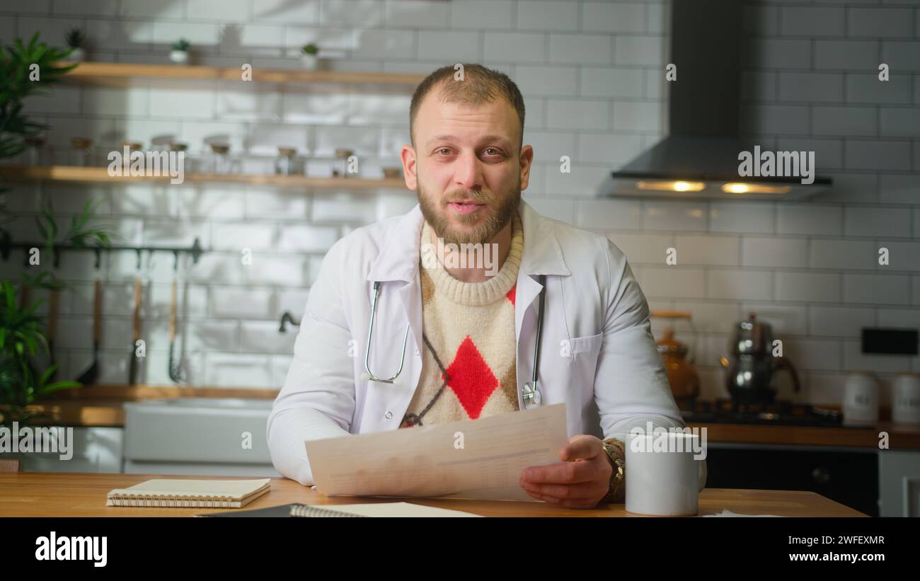 Professional male doctor wear white uniform with stethoscope having ...