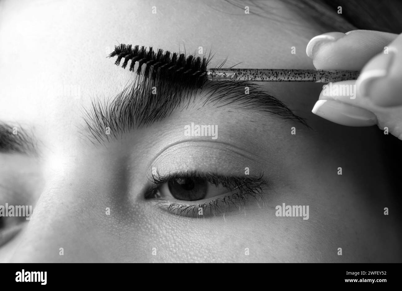 Microblading, modeling brows. Eyebrow makeup. Beauty model shaping ...