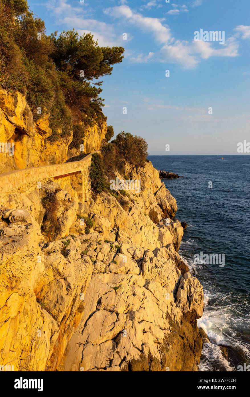 Rocky shoreline landscape of Saint-Jean-Cap-Ferrat resort town with ...