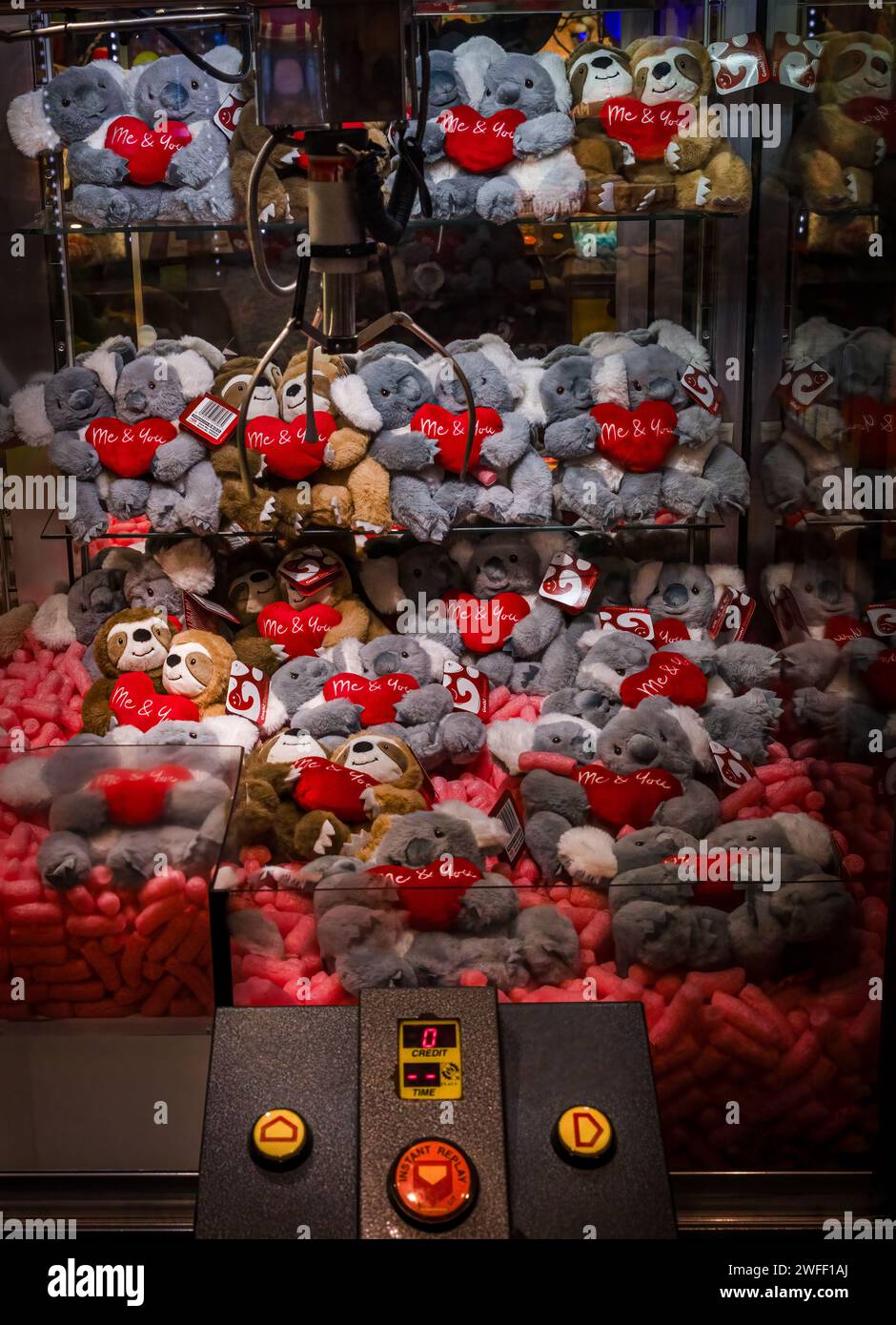 Claw crane machine hi-res stock photography and images - Alamy