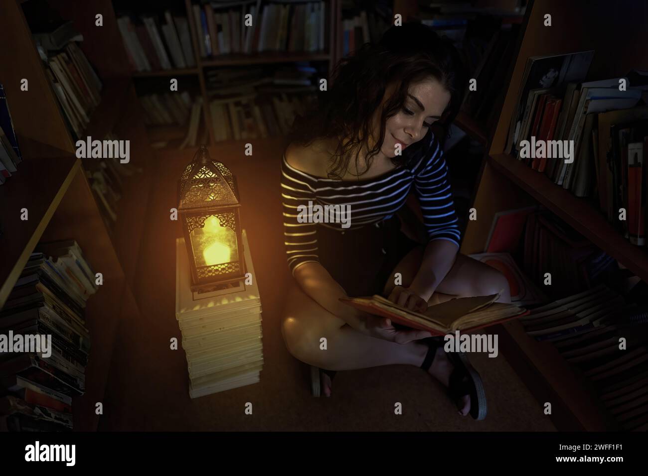 Female library night study hi-res stock photography and images - Alamy