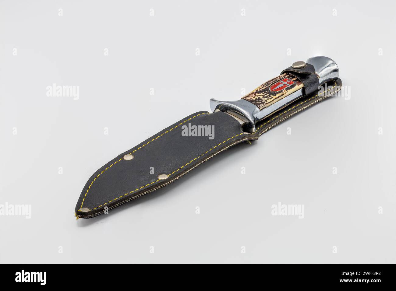 photograph of ancient dagger on white background with many details ...