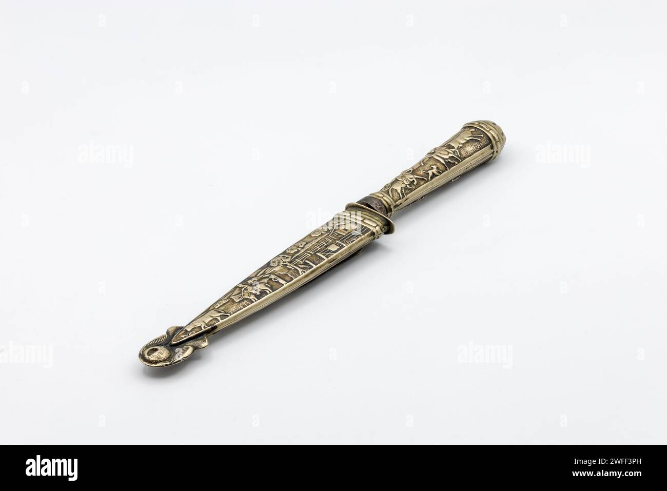 photograph of ancient dagger on white background with many details ...