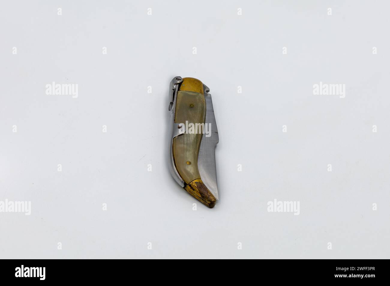 photograph of ancient dagger on white background with many details ...