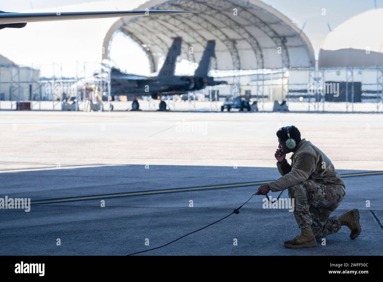 A U.S. Air Force crew chief assigned to the 4th Fighter Wing, performs ...