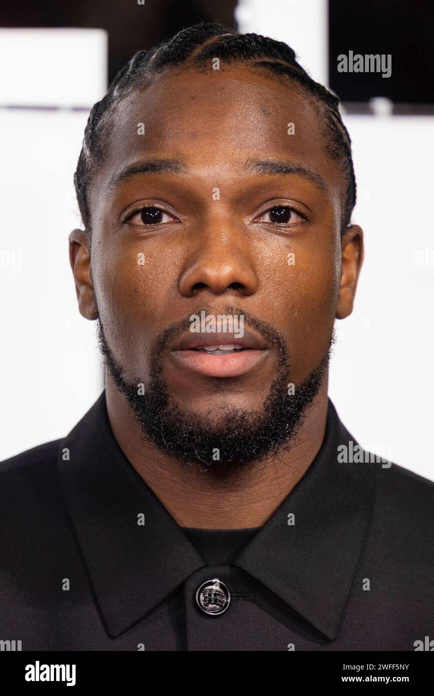 Tosin Cole poses for photographers upon arrival at the premiere of the ...