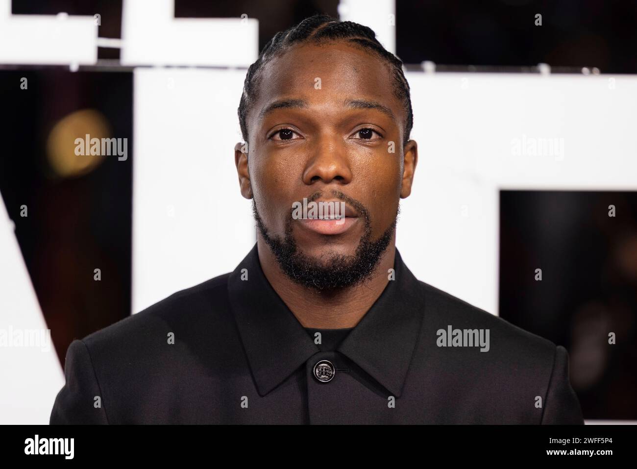 Tosin Cole poses for photographers upon arrival at the premiere of the ...