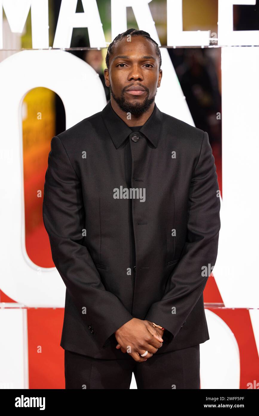 Tosin Cole poses for photographers upon arrival at the premiere of the ...