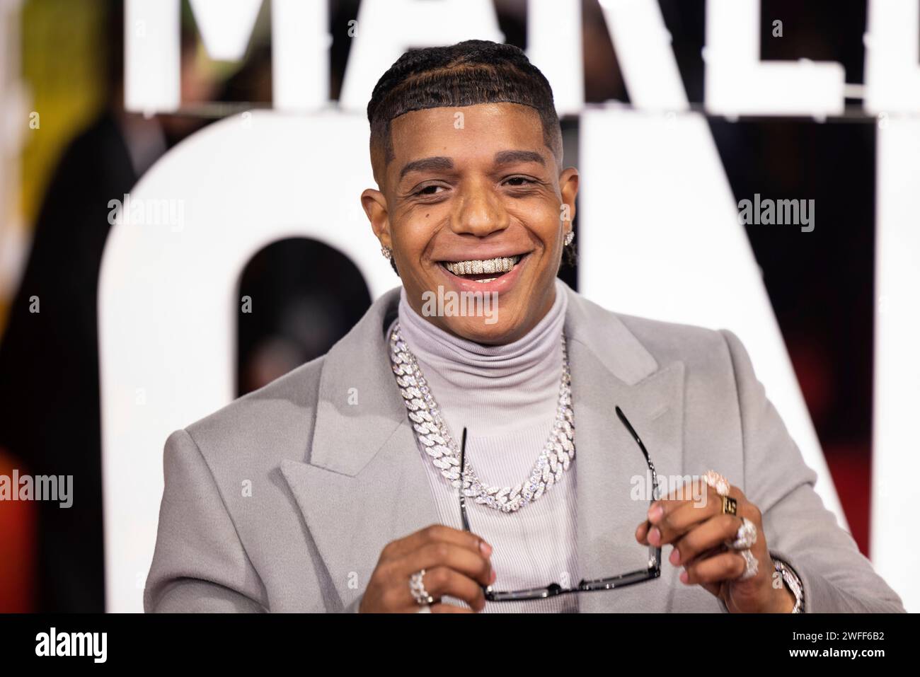 Davo poses for photographers upon arrival at the premiere of the film ...