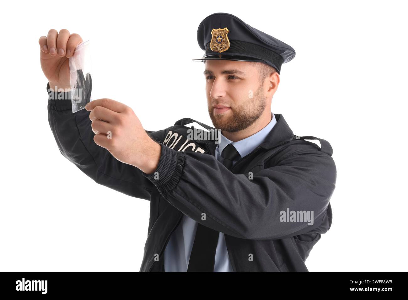 Male police officer with evidence on white background Stock Photo - Alamy