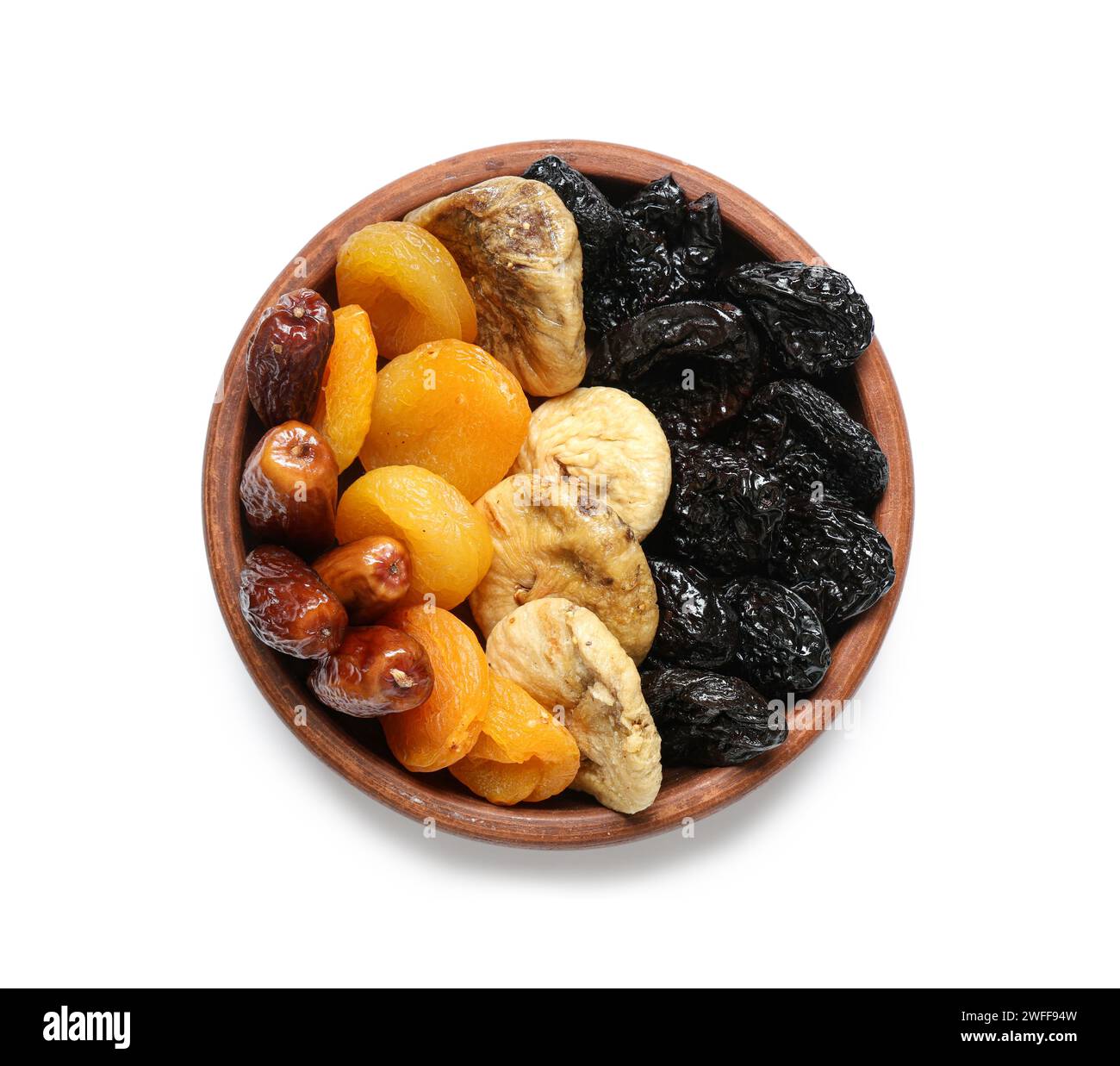 Bowl of tasty dried fruits for Ramadan on white background Stock Photo ...
