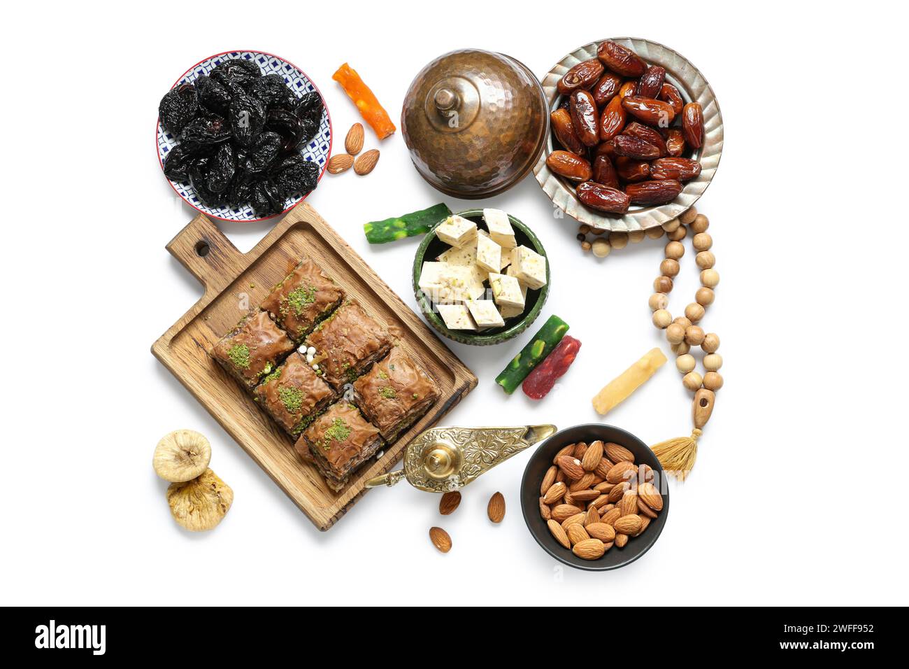 Composition with traditional Eastern sweets, Aladdin lamp and tasbih ...