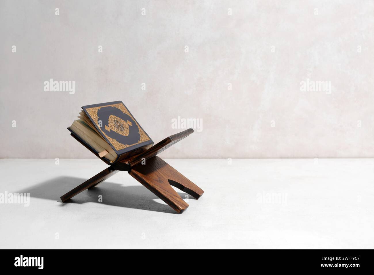 Rehal with Koran for Ramadan on white grunge background Stock Photo - Alamy