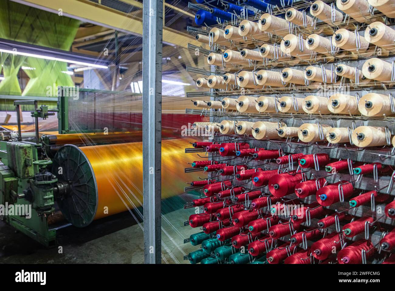 Threading an industrial sewing machine hi-res stock photography and ...