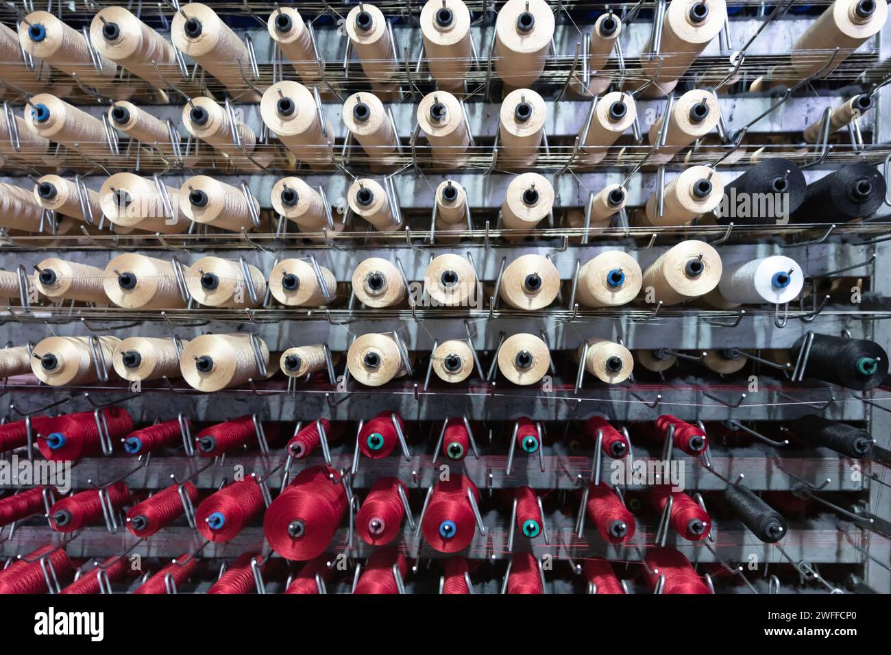 Threading an industrial sewing machine hi-res stock photography and ...