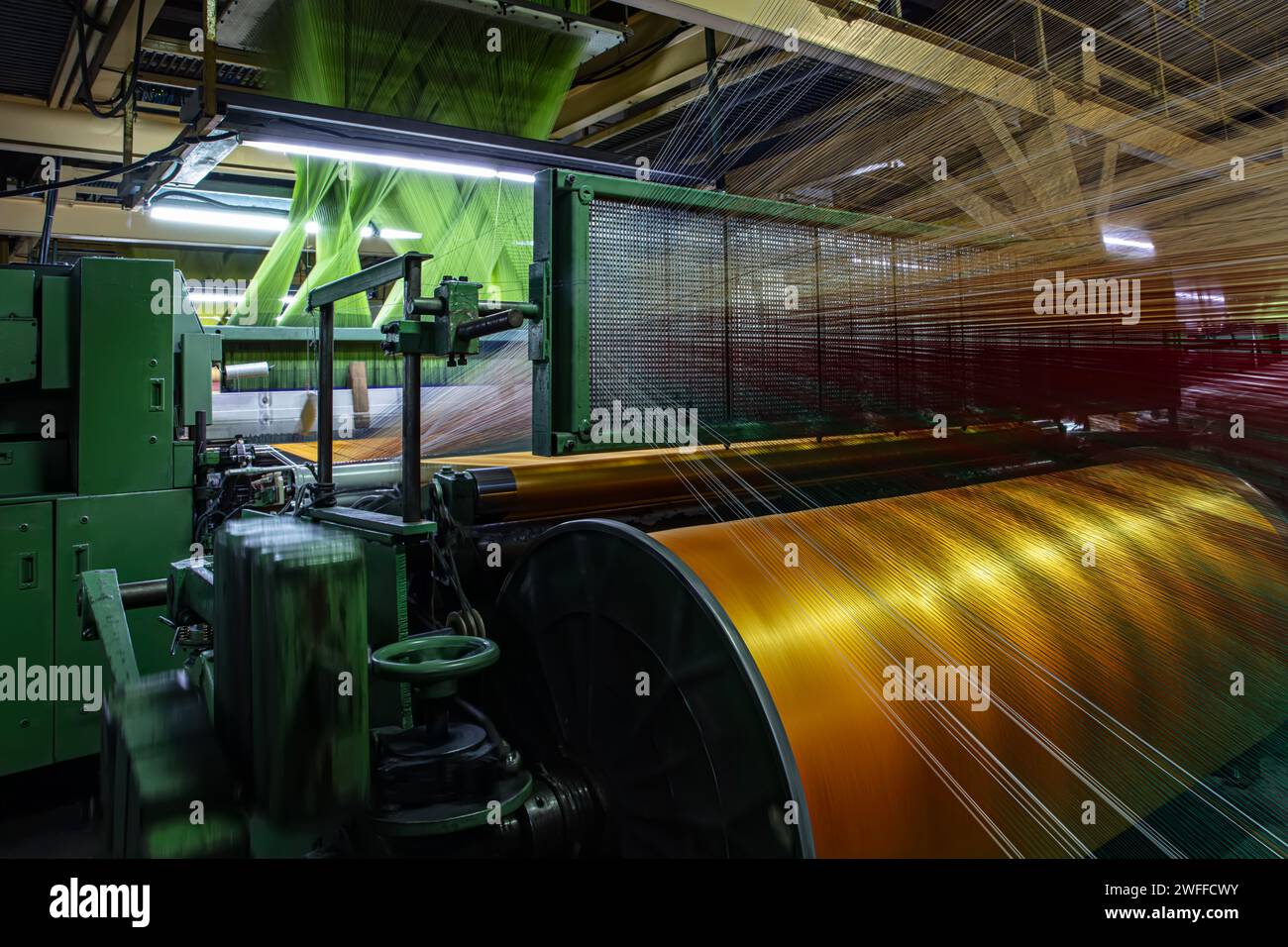 Threading an industrial sewing machine hi-res stock photography and ...