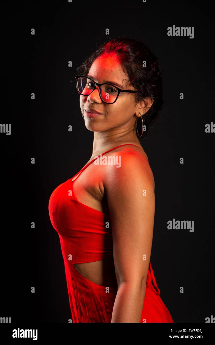 Beautiful young brunette woman, wearing prescription glasses, wearing ...