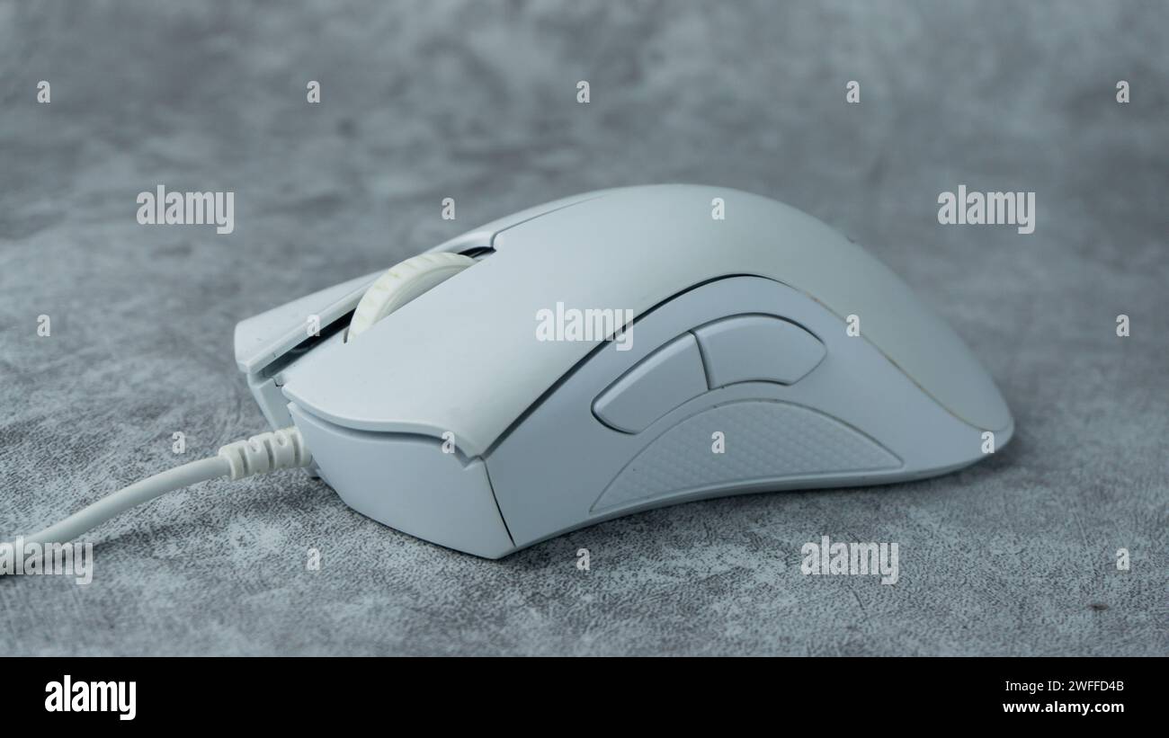 White PC mouse on a gray background with concrete texture Stock Photo ...