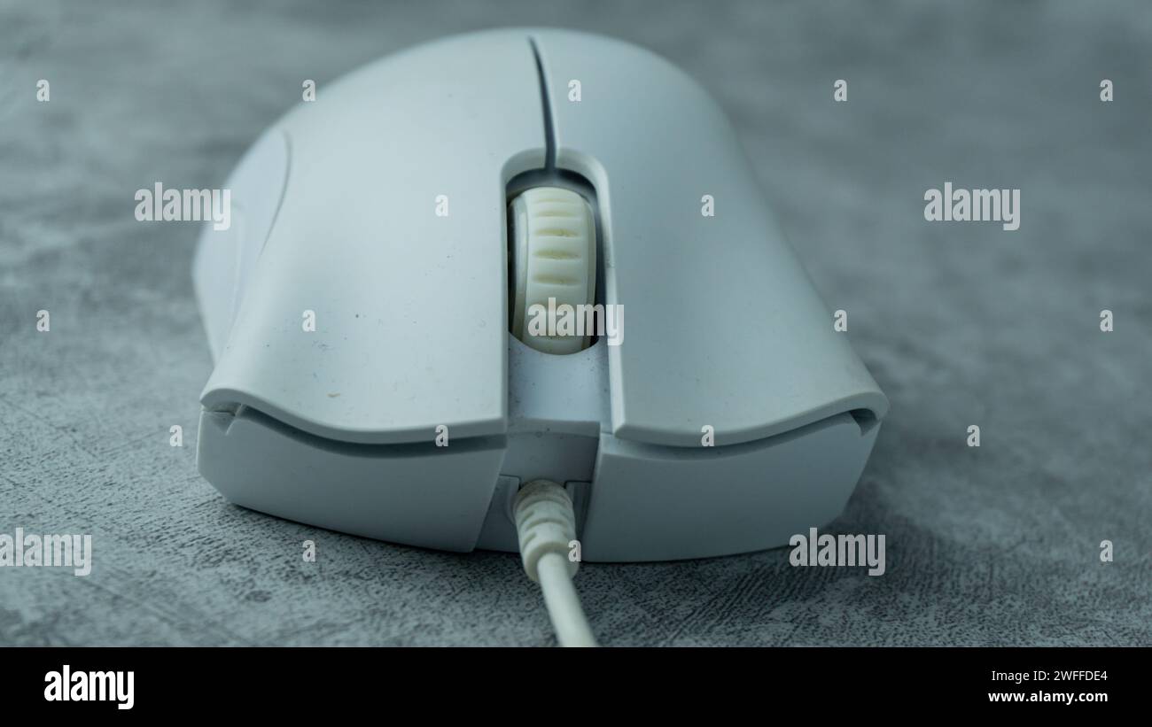 White PC mouse on a gray background with concrete texture Stock Photo ...