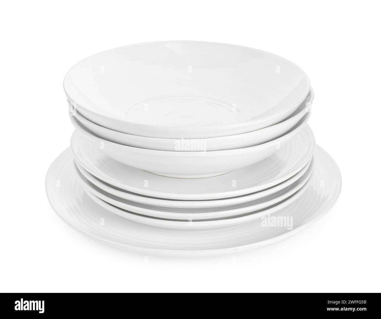 Stack of beautiful ceramic plates and bowls isolated on white Stock ...
