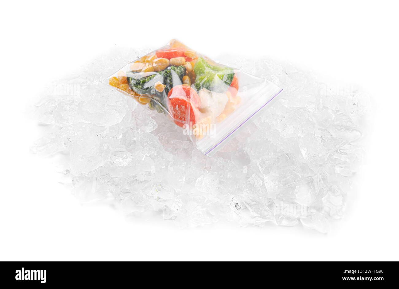 Bag of different frozen vegetables and ice isolated on white Stock ...